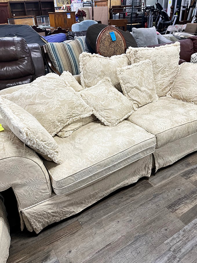 This cream damask sofa whispers tales of Sunday afternoons and family gatherings, ready for Act Two.