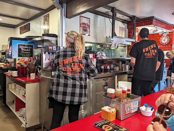 The staff moves with the practiced efficiency of people who've turned breakfast into performance art, complete with coffee refill encores.