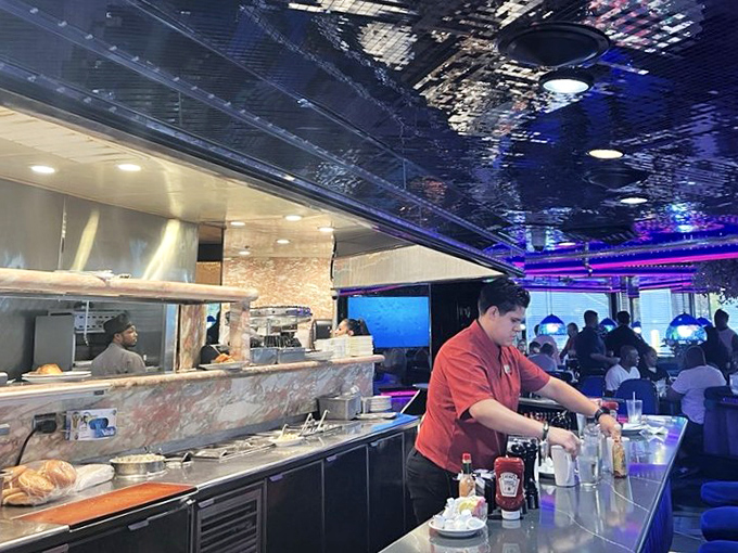 Where culinary magic happens &ndash; the open kitchen gives you a front-row seat to the choreographed chaos that produces those legendary plates.