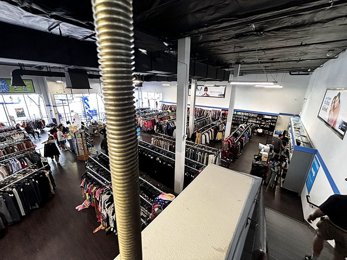 The thrill of the hunt from above. This bird's-eye view shows the magnificent organized chaos that makes thrifting so addictive.