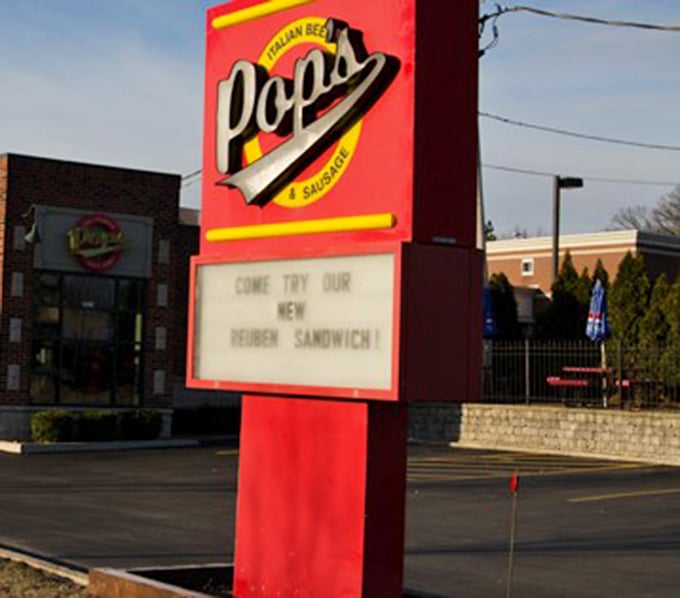 The iconic Pop's sign beckons hungry travelers like a lighthouse guiding ships to safe harbor. "Try our Reuben" is always good advice.