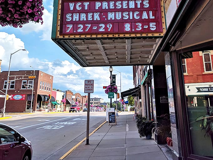 The Temple Theatre's marquee announces "Shrek: The Musical," proving that Broadway spirit thrives even in towns where corn outnumbers people.