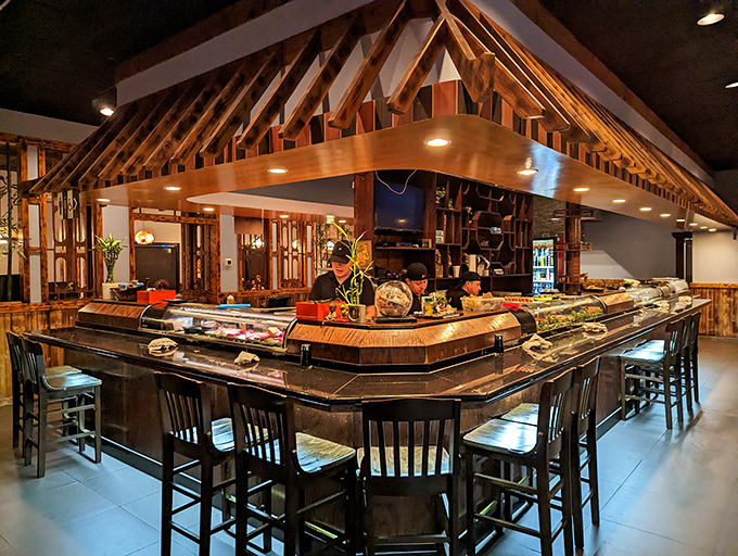 The sushi counter&mdash;where dreams are made, one perfectly formed nigiri at a time, under a roof that screams "authentic" without saying a word.