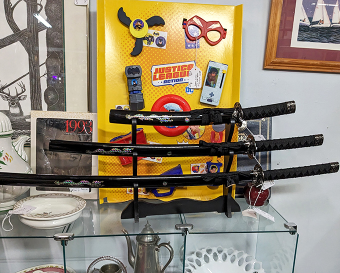 Samurai dreams meet pop culture in this display. Those swords have seen less action than your kitchen knives, but they tell better stories.