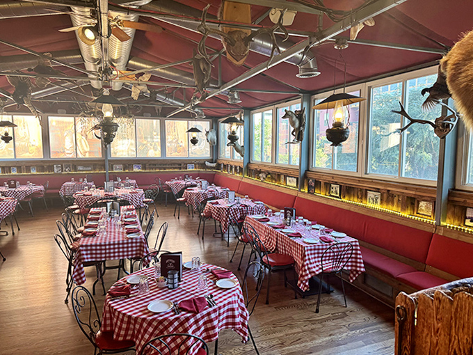 The upstairs dining room, where red-checkered tablecloths and mounted trophies create the perfect backdrop for your "I ate what?" stories.