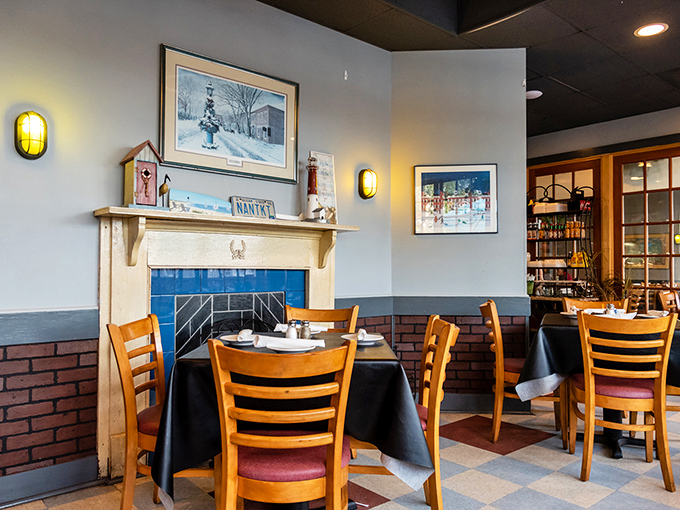 Cozy dining nooks with New England-inspired d&eacute;cor that whispers "stay awhile" without shouting "theme restaurant." That fireplace isn't just for show.