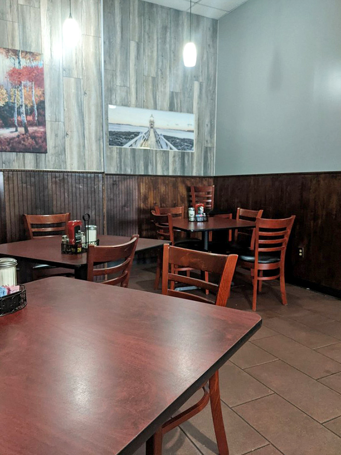 The dining area's wood-paneled walls and simple tables create that "everybody knows your name" vibe that's increasingly rare in our chain-restaurant world.