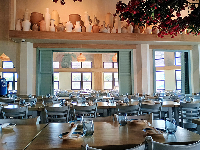 Terracotta pots and azure shutters transport you straight to a taverna overlooking the Aegean. The collection of vessels above isn't decoration&mdash;it's heritage on display.