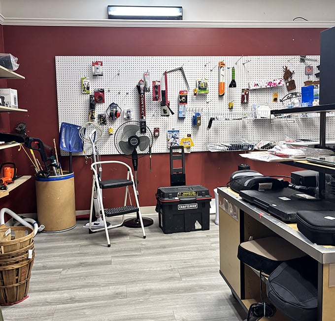 Tool heaven for the DIY enthusiast! From ladders to power tools, this pegboard paradise has everything needed for weekend warriors and serious fixers.