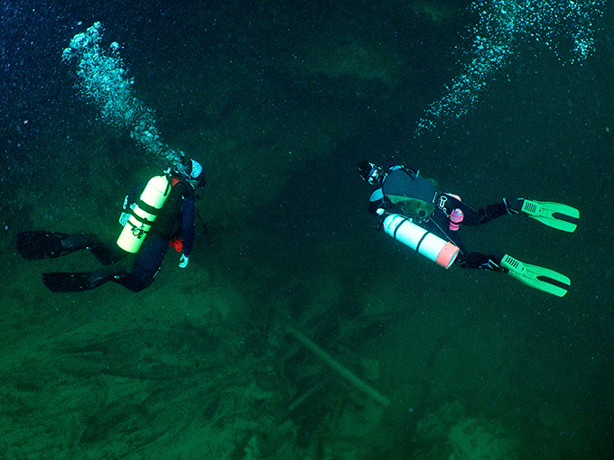Beneath the surface, another world awaits &ndash; where divers glide through liquid crystal and bubbles rise like champagne in a glass.