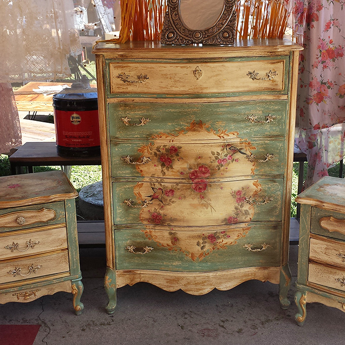 This hand-painted dresser tells stories of French countryside romance. Marie Antoinette would approve of this shabby-chic statement piece.