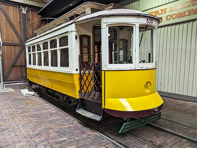 The bright yellow and white streetcar #530 reminds us that public transportation once had style and character beyond today's utilitarian buses.