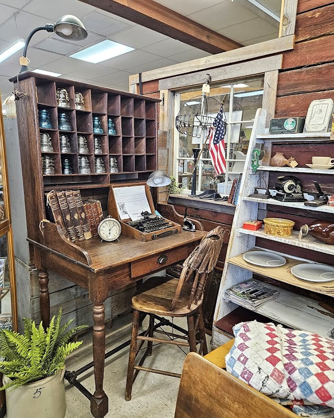 The perfect writer's nook, complete with vintage desk, typewriter, and pigeonhole organizer. Hemingway would approve of this setup.