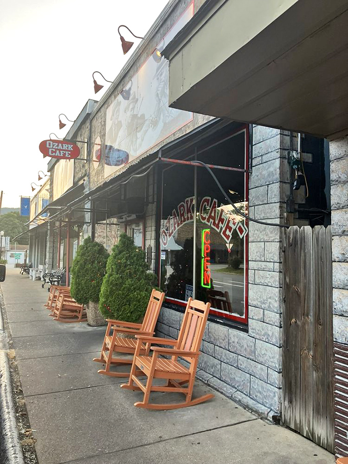Wooden rocking chairs on the sidewalk aren't just seating &ndash; they're an invitation to slow down and remember what matters in a world that moves too fast.