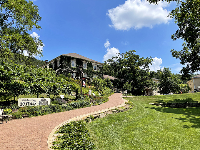 Brick pathways wind through manicured grounds, inviting leisurely strolls between tastings and contemplative wine-induced philosophizing.