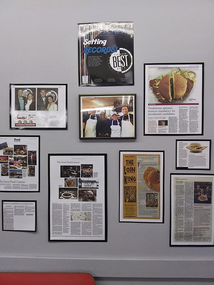 The wall of fame tells stories spanning decades—newspaper clippings and photos chronicling a restaurant that became an institution one tenderloin at a time.