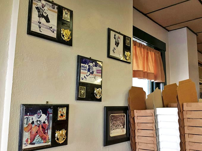 Sports memorabilia adorns the walls, reminding you that in Western Pennsylvania, pizza and hockey appreciation go hand in hand.