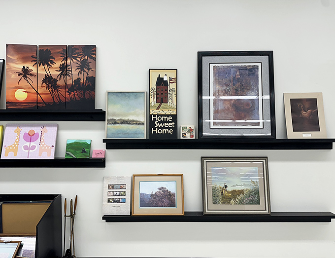 Wall art waits to find new homes, from sunset beach scenes to motivational messages that once adorned someone else's living room.