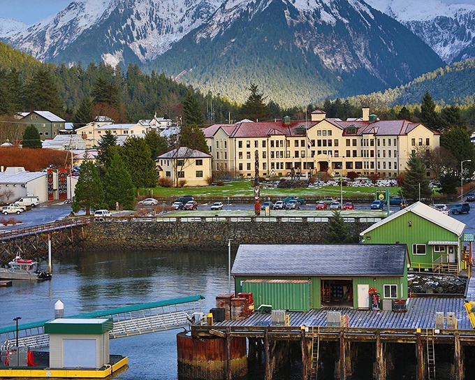 Mountains cradle Sitka's waterfront like protective parents, creating a natural amphitheater where fishing boats perform their daily ballet.