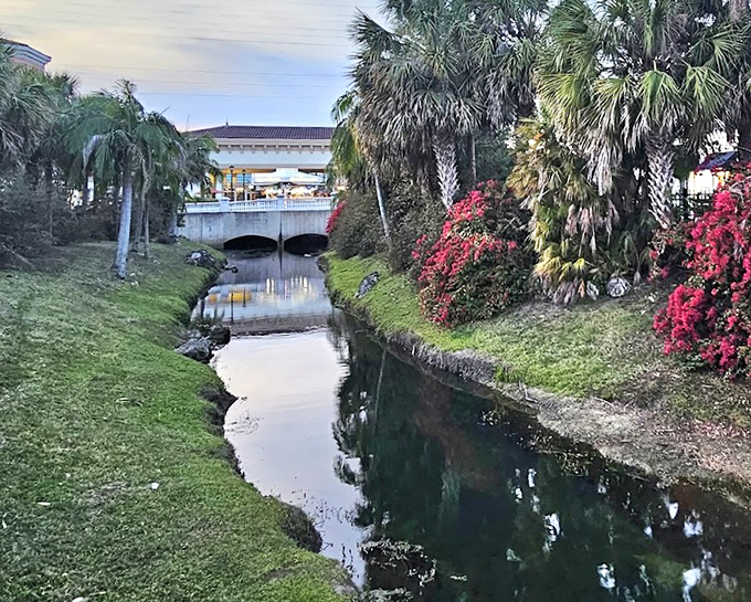 A serene waterway cuts through the property, offering a moment of tranquility between credit card workouts.