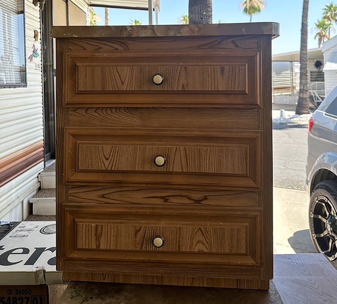 Solid wood craftsmanship that puts today's particle board to shame. This dresser has probably outlived several trends already.