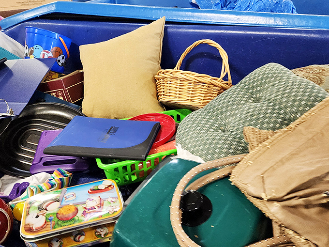 A colorful chaos of household items &ndash; from wicker baskets to children's books &ndash; creates an archaeological dig of American consumer life.