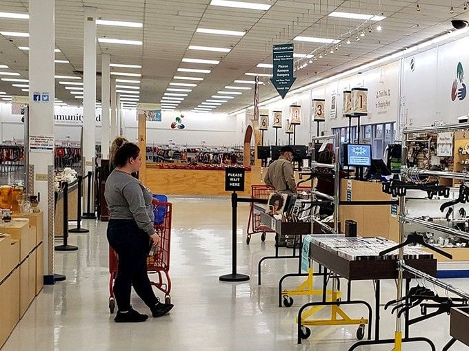 The checkout lines move smoothly as happy shoppers prepare to exit with carts full of victories and wallets still breathing.