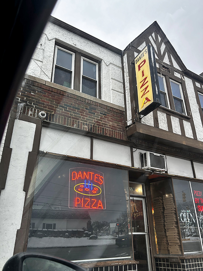 Dante's vintage sign and Tudor styling transport you to another era&mdash;when pizza was an art form, not fast food.