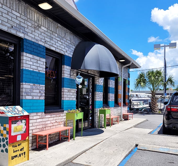 Classic brick and cheerful awning welcome early birds and night owls to breakfast paradise.