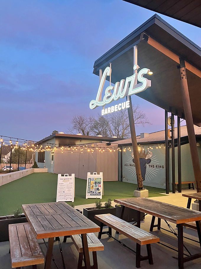 Lewis Barbecue's neon sign glows like a barbecue lighthouse. Guiding hungry souls to a safe harbor of smoked perfection.