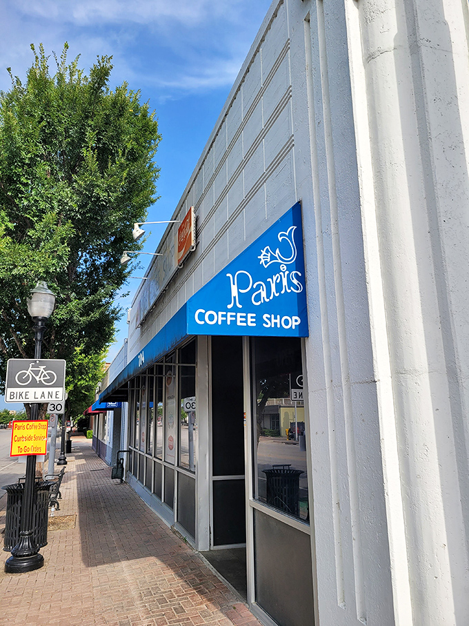Paris Coffee Shop's bright blue awning stands out like a Texas bluebonnet in downtown Fort Worth.
