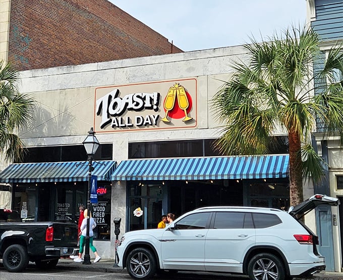 Toast! All Day: Blue awnings and brick—Charleston's classic breakfast uniform. The exclamation point in the name isn't just punctuation—it's a flavor promise.