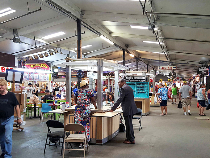 Signs of savings! This indoor marketplace guides shoppers through a maze of possibilities where treasures hide in plain sight.