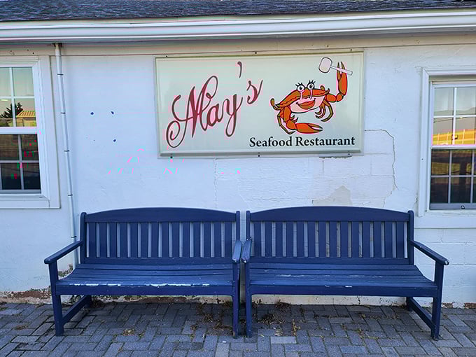 The blue benches outside May's invite you to sit a spell before diving into seafood heaven. Simple pleasures, extraordinary flavors.