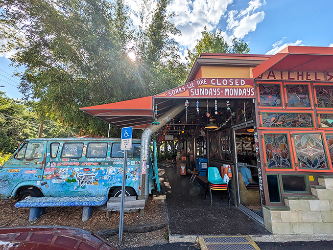 The painted blue van outside Satchel's signals this isn't your average pizza joint. The whimsical exterior matches the creative pies inside.