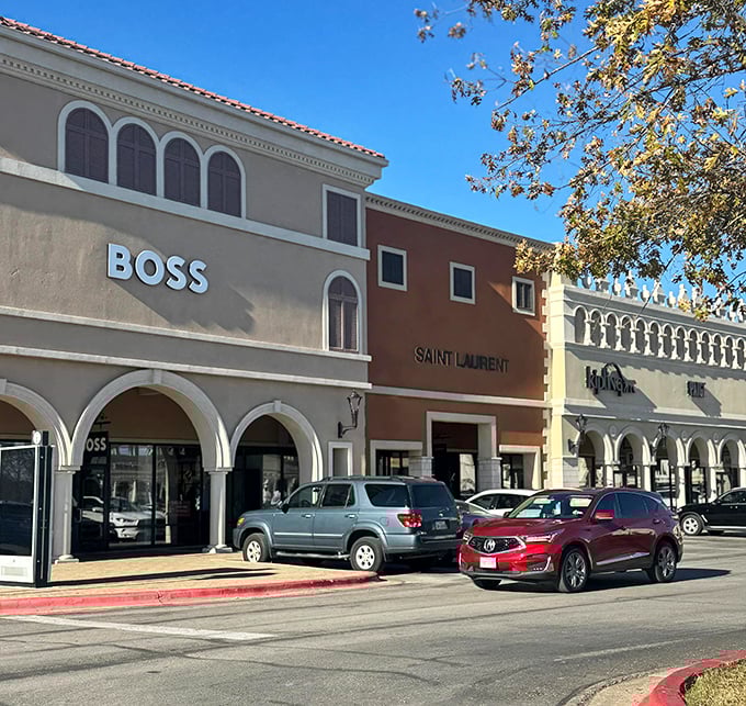 Outdoor tables where shoppers strategize their next move like generals planning retail conquests.