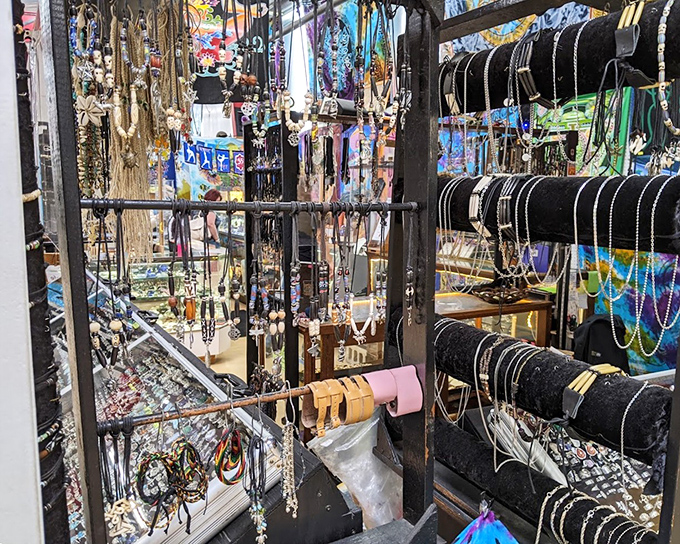 A jewelry vendor's dream display, where necklaces hang like metallic waterfalls. Someone's perfect statement piece is hiding in this glittering forest.