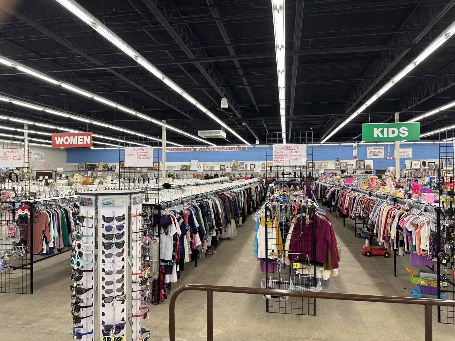 Endless rows of curated treasures await your discovery as you browse through the vibrant aisles of this local thrift shop.