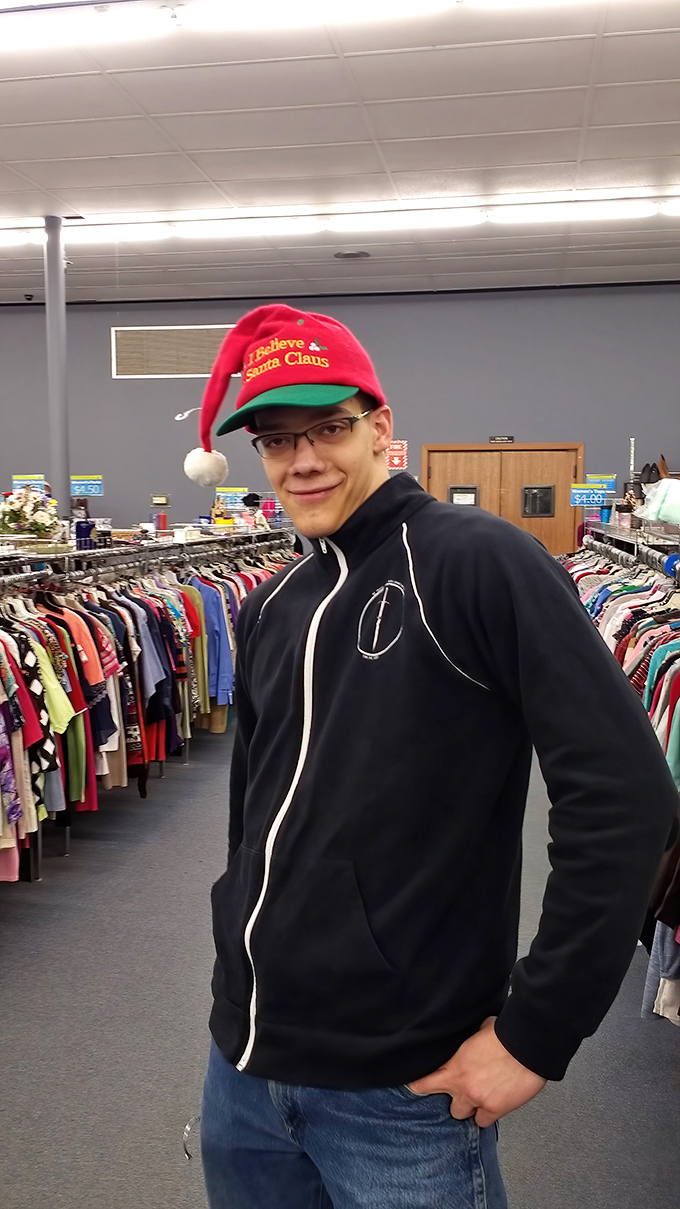 Holiday spirit comes in all forms at Goodwill, including festive headwear that transforms ordinary shoppers into seasonal ambassadors of cheer.