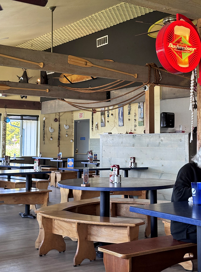 Wooden oars hang from the ceiling like badges of honor in this unpretentious dining room where seafood reigns supreme.