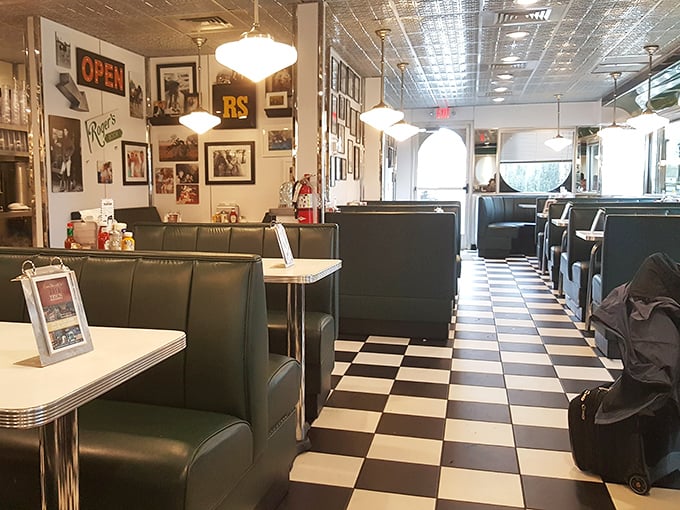 The classic diner interior feels like stepping into a Norman Rockwell painting where everyone's just waiting for their turn to order the famous Eggs Benedict.