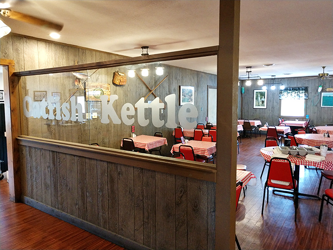 The wood-paneled dining room with "Catfish Kettle" etched in glass speaks to a place that knows exactly what it is &ndash; no identity crisis in this establishment.