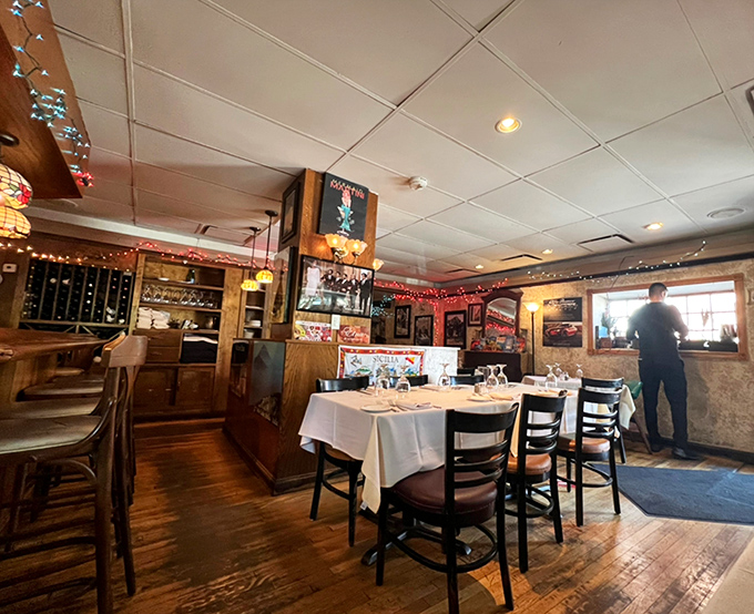 White tablecloths and warm wood create that perfect balance of casual elegance. No pretension, just good vibes and better food.