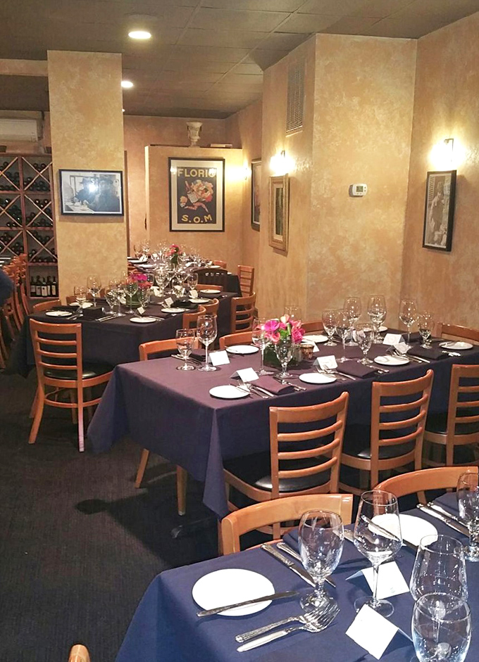 Tables set with precision and care&mdash;each place setting an invitation to slow down and savor what's coming.