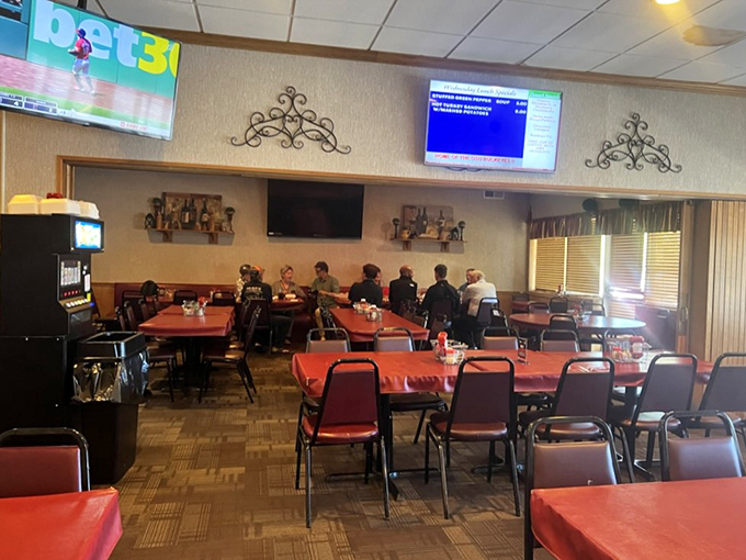 Red tablecloths add a touch of casual elegance to the dining room. The perfect backdrop for the comfort food masterpieces to come.