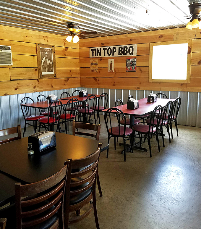 Another angle of barbecue paradise &ndash; where wood, metal, and red accents create the perfect stage for meat-based magic to unfold.
