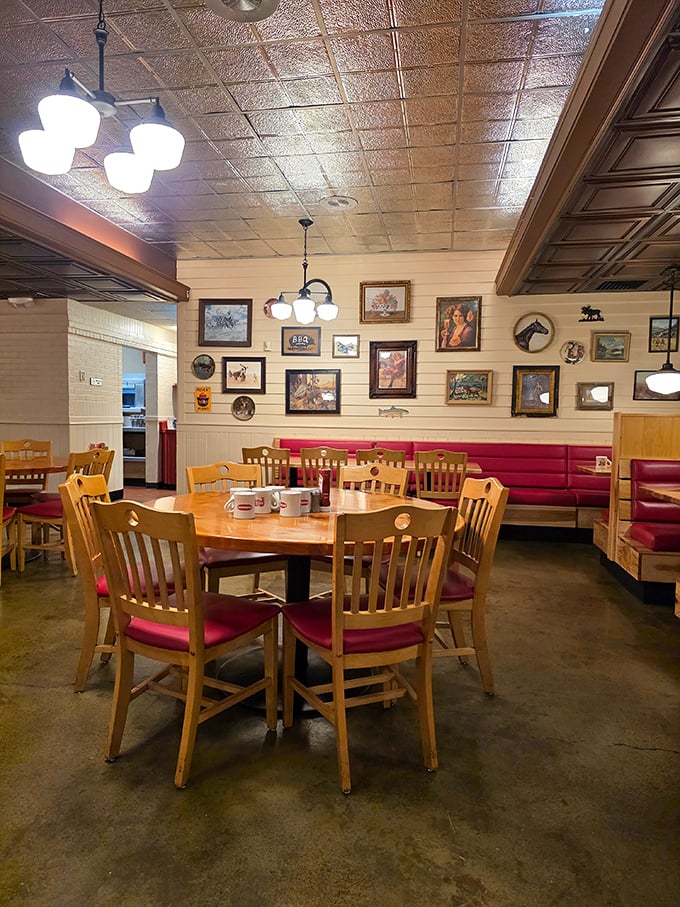 Western charm meets comfort in this dining space where every framed picture on the wall seems to say, "Relax, you're among friends who also love meat."