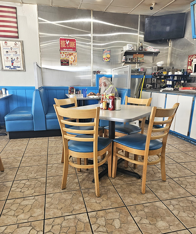 Clean, simple tables with the essentials &ndash; ketchup, syrup, and enough space for plates that won't leave you hungry.