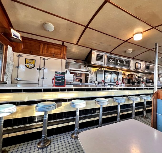 The diner's interior curves like a vintage train car, with wood accents and classic fixtures that Hollywood set designers try desperately to replicate.