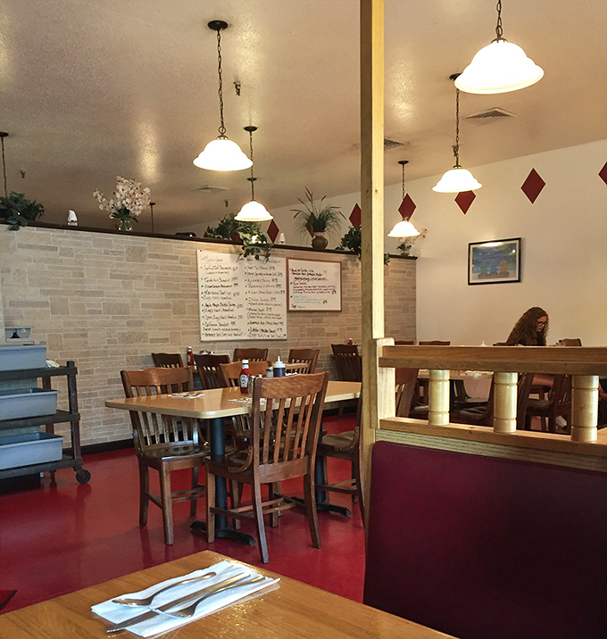 Another angle reveals Linda's thoughtful interior design &ndash; where pendant lights cast a warm glow on conversations and calorie-laden celebrations.